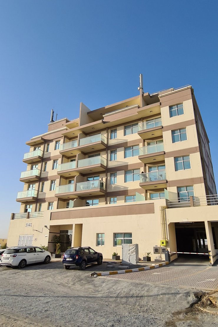 Al Hikma Building offer residential apartments in International City ...